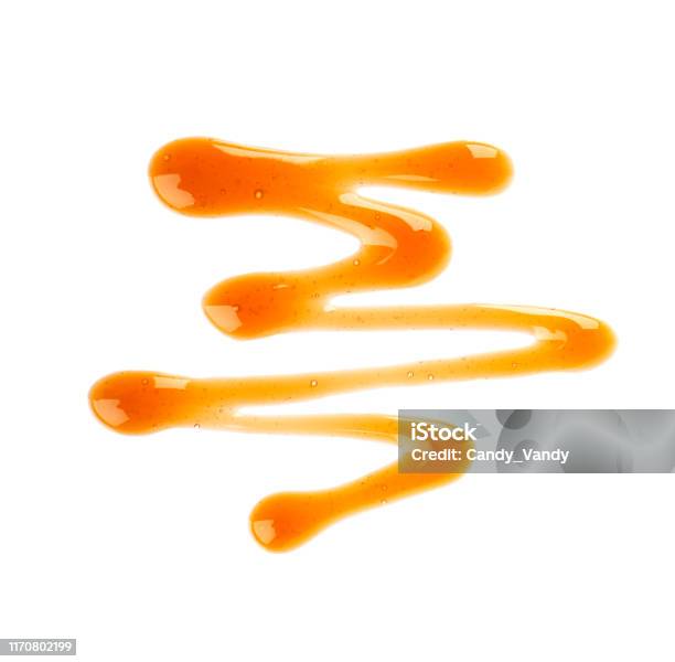Caramel Syrup Drizzle Isolated On White Background Splashes Of Sweet