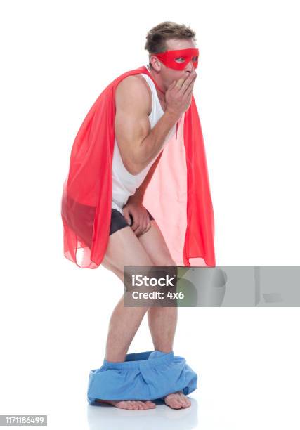 Man In Casual Clothes With Super Hero Cape Is Caught With His Pants