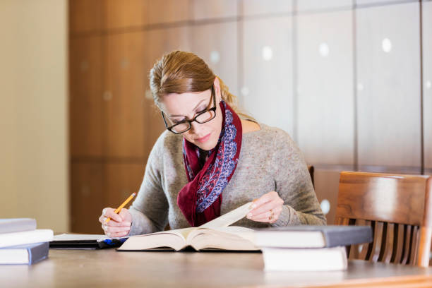 Free Stock Photo of Woman in the library writing | Download Free Images ...