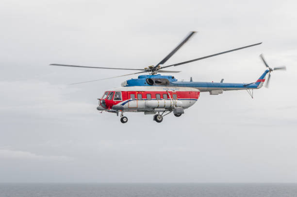 Free Stock Photo of A helicopter flying over the ocean | Download Free ...