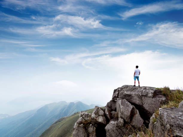 Free Stock Photo of Person Standing on Top of Rock Formation | Download ...