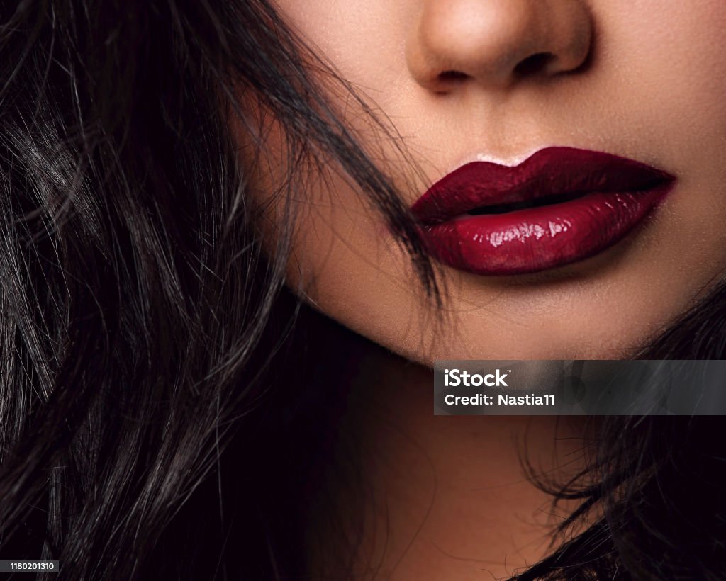 Beautiful Bright Makeup Woman With Long Black Curly Hair Style Burgundy
