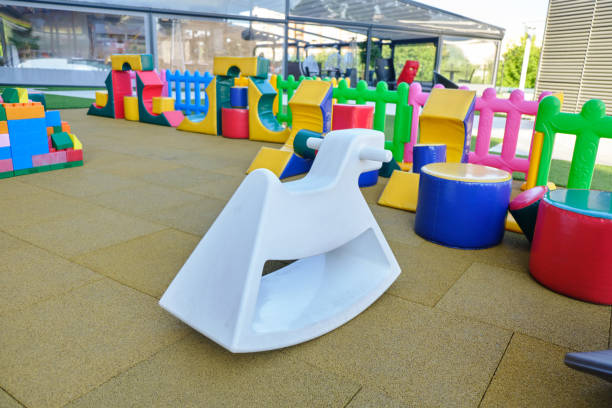 Horse-shaped swing awaits children on a playground | Free Stock Image ...
