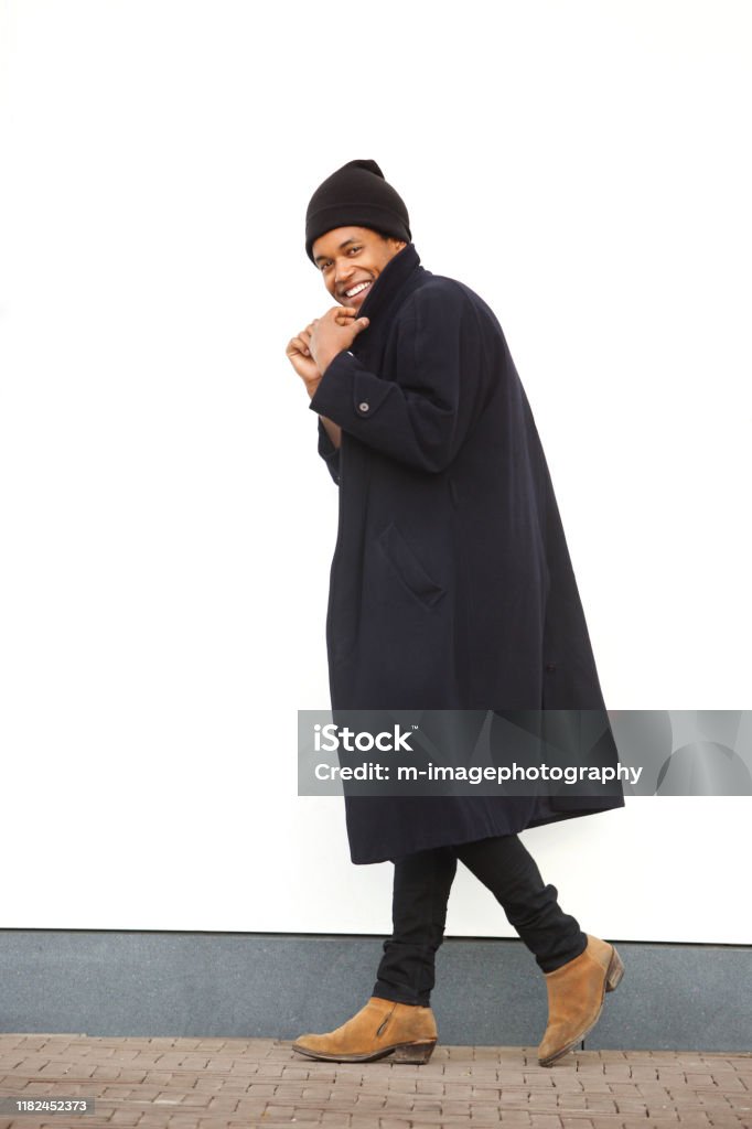 Full Body African American Male Fashion Model Walking And Smiling With