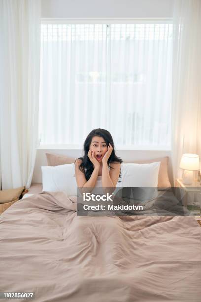 Asian Girl Shocked As She Wakes Up Late Stock Photo - Download Image ... Asian Girl Shocked As She Wakes Up Late Stock Photo - Download Image ...
