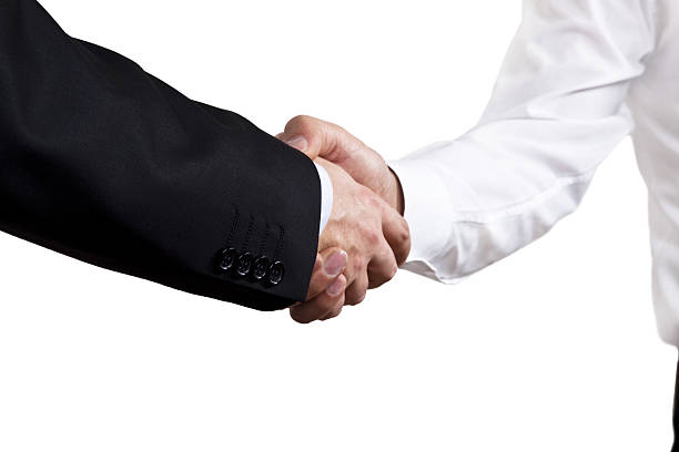 Free Stock Photo of Business people shake hands to show cooperation ...