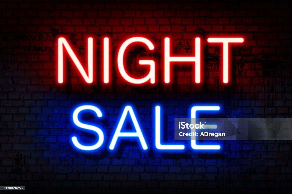 Night Sale Neon Sign With Luminous Letters Of Red And Blue On A Black