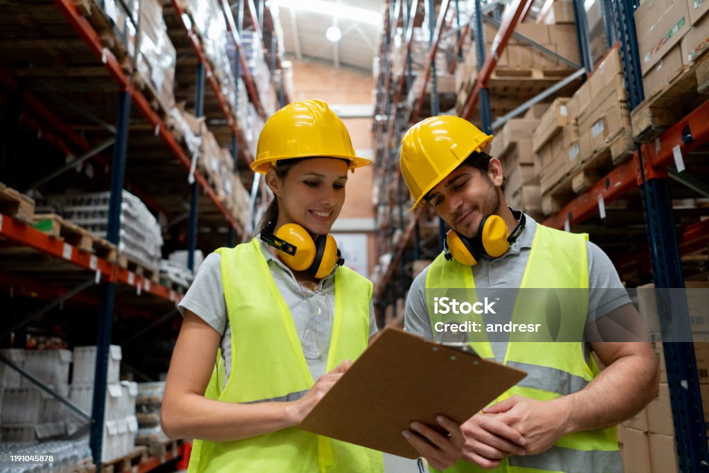 Manual Workers Working At A Warehouse Stock Photo - Download Image Now ... Manual Workers Working At A Warehouse Stock Photo - Download Image Now ...