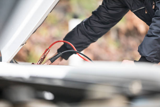 Free Stock Photo of Man connecting jumper cables to battery | Download ...