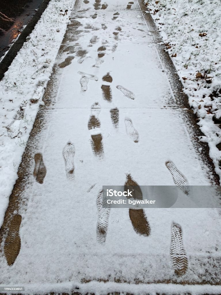 Footprints In Snowy Sidewalk Stock Photo - Download Image Now ... Footprints In Snowy Sidewalk Stock Photo - Download Image Now ...