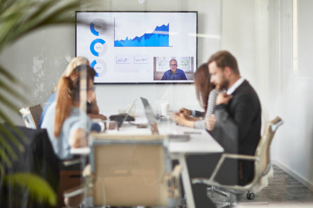 Free Stock Photo of A young business Woman looking at screen while ...
