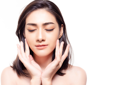 Beautiful Young Asian Woman Close Eyes And Touching Her Beauty Face