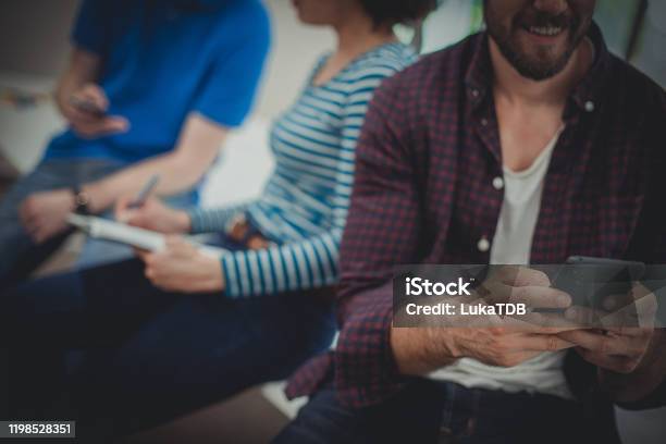 Three Coworkers Taking A Break Stock Photo - Download Image Now - Adult ... Three Coworkers Taking A Break Stock Photo - Download Image Now - Adult ...