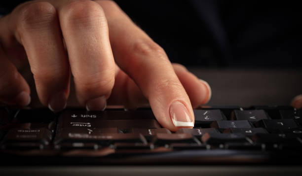 Free Stock Photo of Woman typing on laptop keyboard - b&w | Download ...