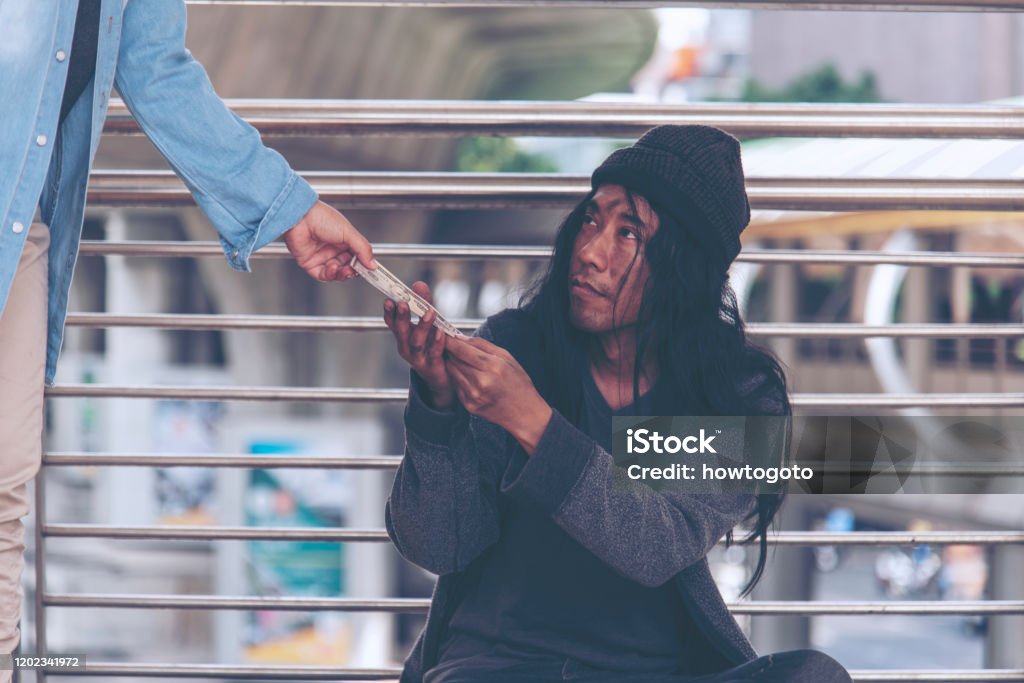 Woman Helping Hands To Homeless People Poverty Beggar Man Holding Hands
