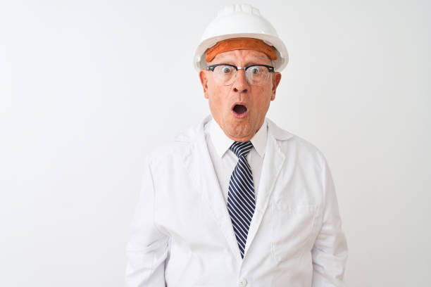 Free Stock Photo of Panicking male engineer standing on white ...
