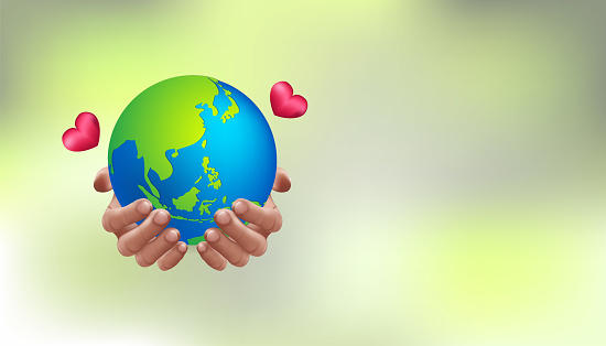 Earth Day Save Our Planet Concept Human Hands Holding Globe With Bokeh