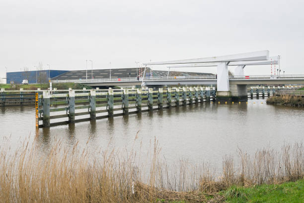 Free Stock Photo of A bridge over a river with a parking lot and a ...