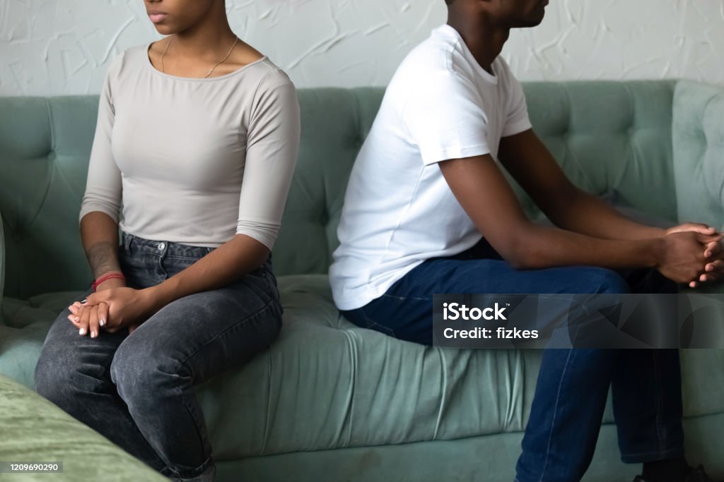 African American Couple Sit Separately Avoid Talking After Fight Stock