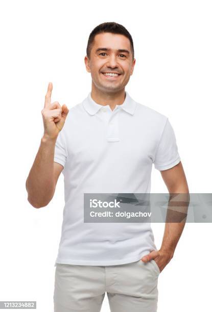 Smiling Man Pointing Finger Up Stock Photo - Download Image Now - Men ... Smiling Man Pointing Finger Up Stock Photo - Download Image Now - Men ...