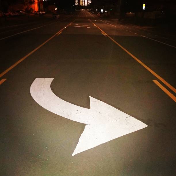 Free Stock Photo of City Street at Night With White Arrow | Download ...