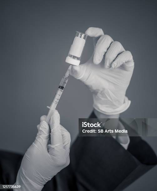 Vaksin Virus Corona Covid19 Ilmuwan Dokter Dengan Jarum Suntik ... Vaksin Virus Corona Covid19 Ilmuwan Dokter Dengan Jarum Suntik ...