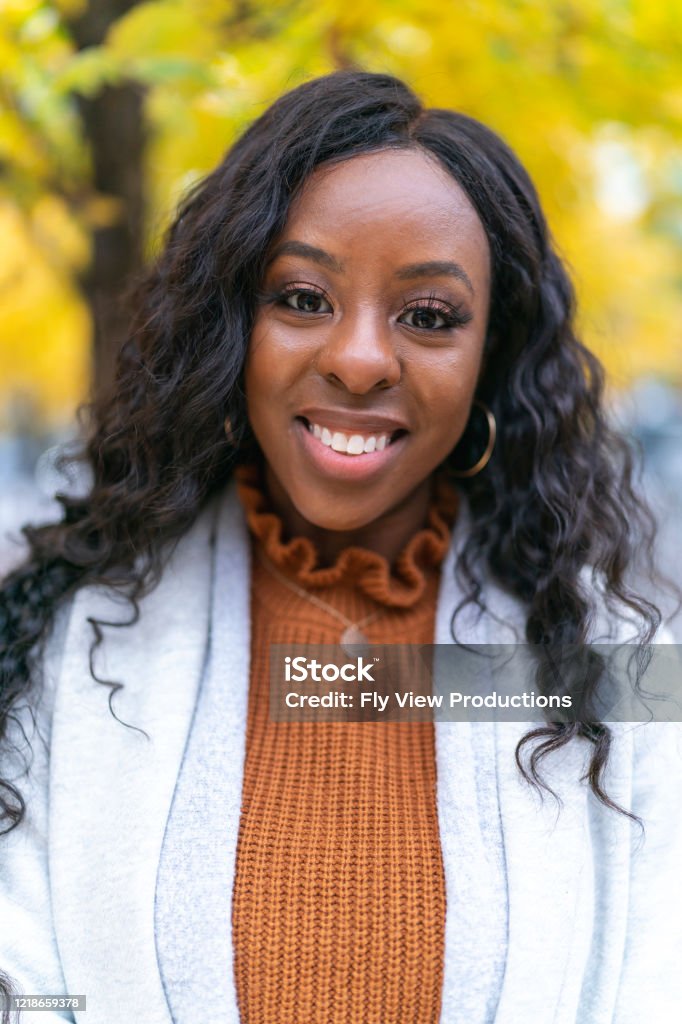 Confident Young Black Woman Smiling Stock Photo - Download Image Now ... Confident Young Black Woman Smiling Stock Photo - Download Image Now ...