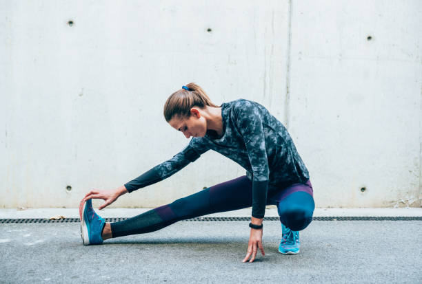 Free Stock Photo of Female Athlete trying to stretch | Download Free ...