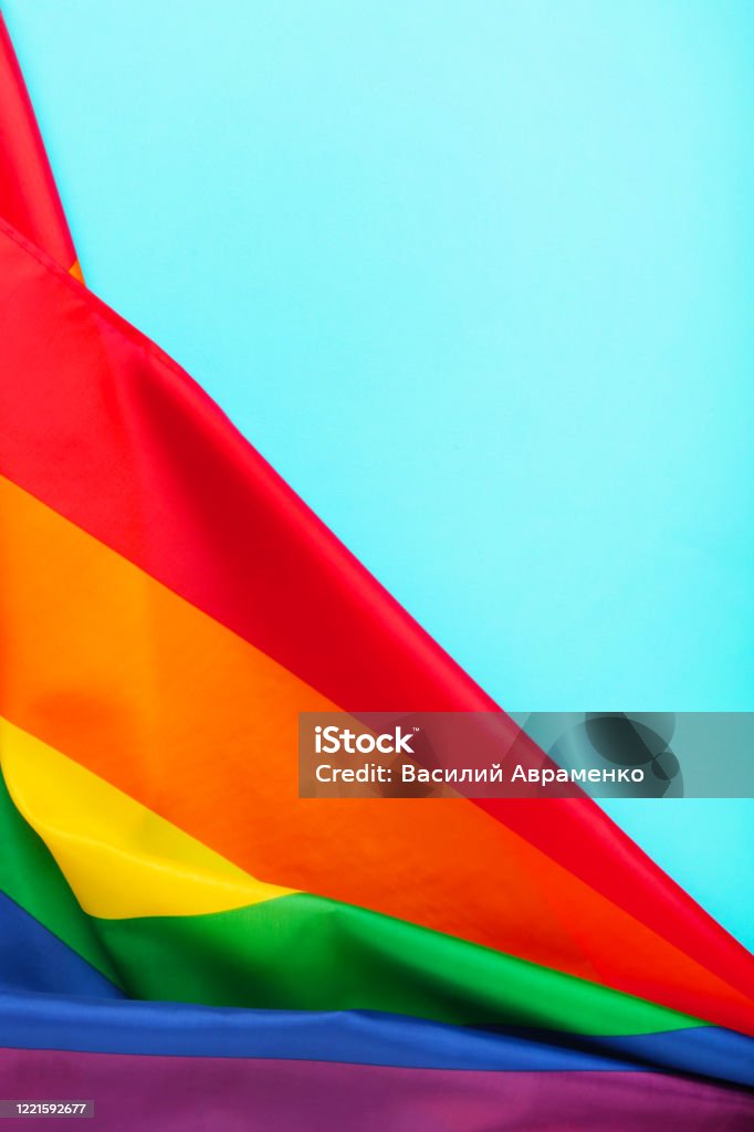 Rainbow Lgbt Flag On Yellow Background With Copy Space Vertical Foto