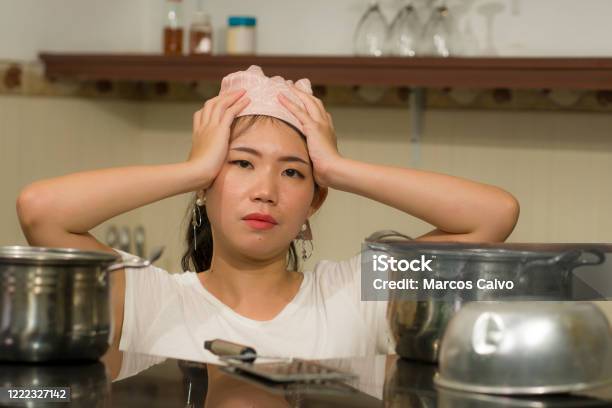 Young Frustrated Asian Woman In Domestic Chores Stress Lifestyle Home