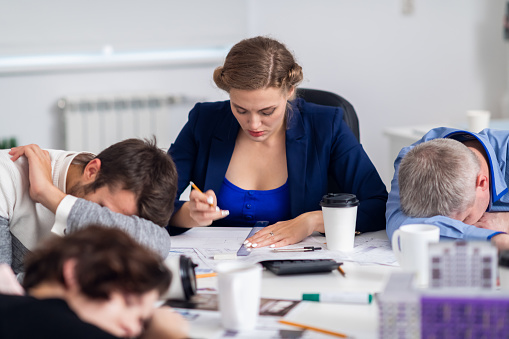 Exhausted Office Workers Resting On Their Workplace While Havin Stock ... Exhausted Office Workers Resting On Their Workplace While Havin Stock ...