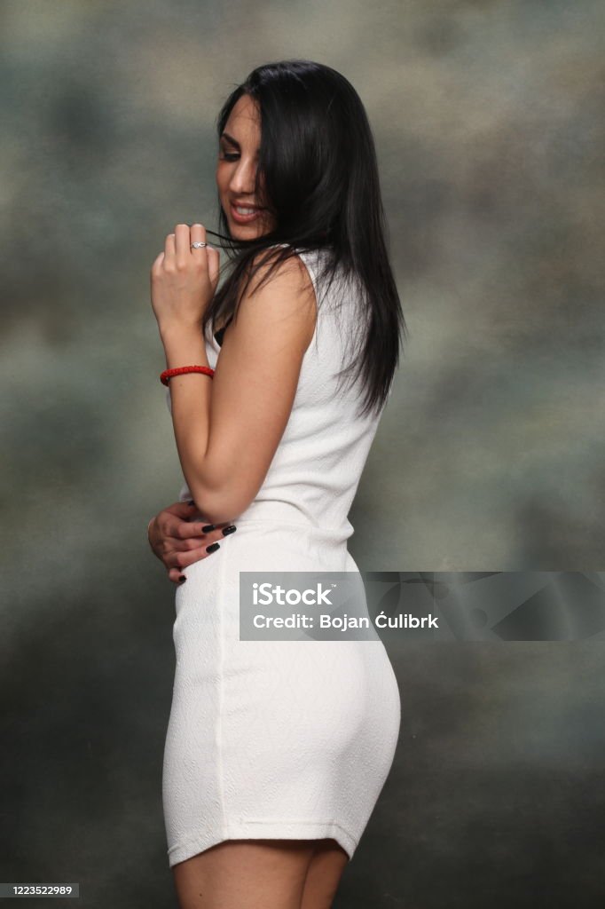 Beautiful Fancy Glamourous Caucasian Girl With Black Hair Posing In