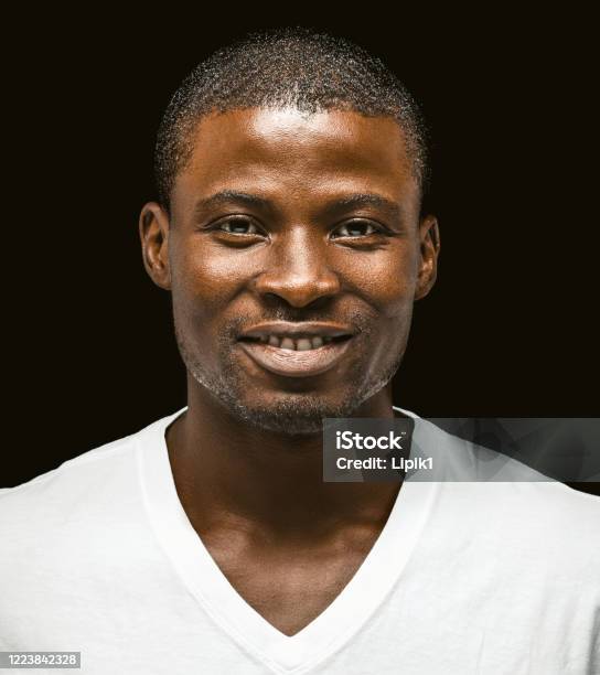 Smiling Afro American Man Looking At Camera Portrait Of Darkskinned Man