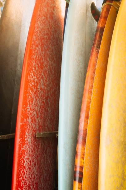 Free Stock Photo of Red Surfboard Resting on Top of Surfboard Stack ...