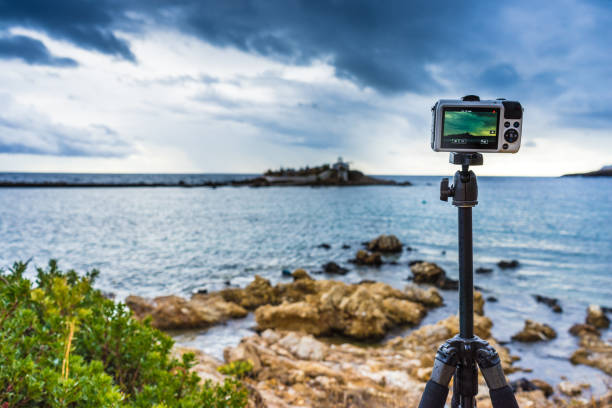 Free Stock Photo of Man Taking a Picture of the Ocean With a Camera ...