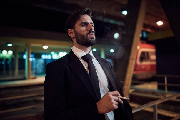Free Stock Photo of Man Standing on Train Track Smoking a Cigarette ...