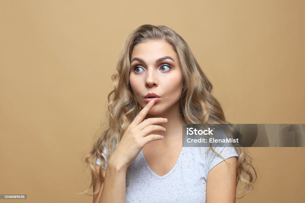 Portrait Of Young Beautiful Cheerful Girl Smiling Looking At Camera