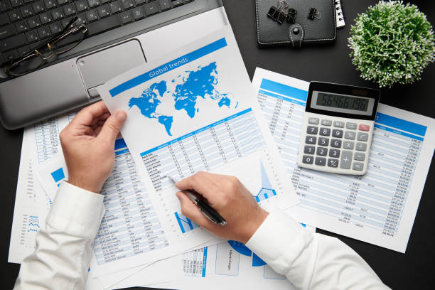 Free Stock Photo of Businessman With Pen Over Financial Data - Finance ...