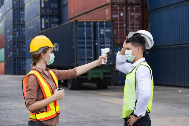 Free Stock Photo of Dock worker getting temperature check | Download ...