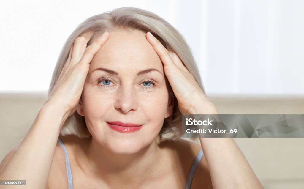 Fifty Year Old Woman Is Very Pleased With Her Wellgroomed Face Plastic