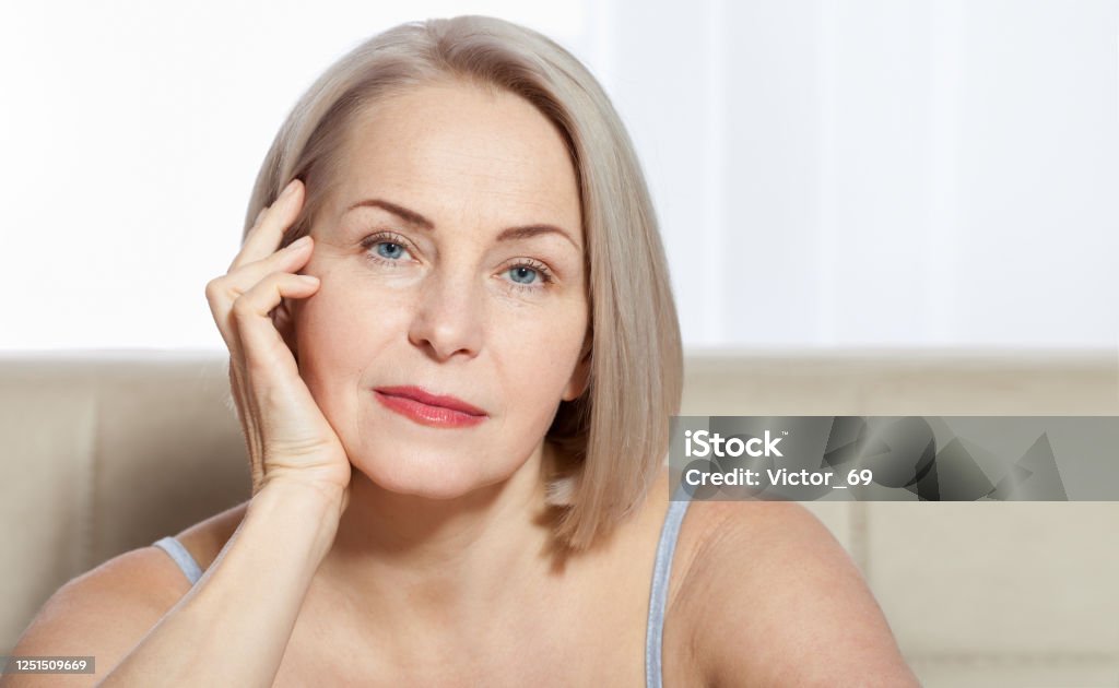 Fifty Year Old Woman Is Very Pleased With Her Wellgroomed Face Plastic