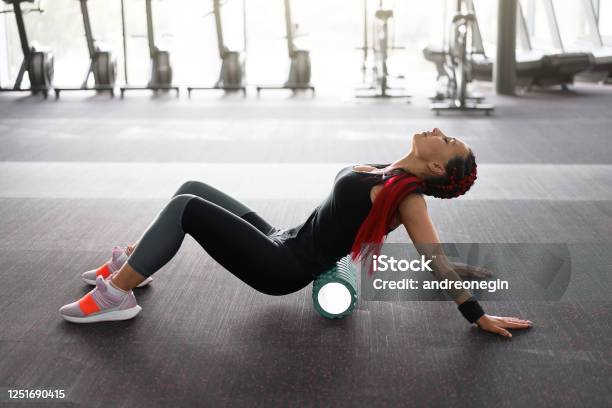 Woman Massaging Foam Roll Leg Gym Myofascial Release Exercise Rolling