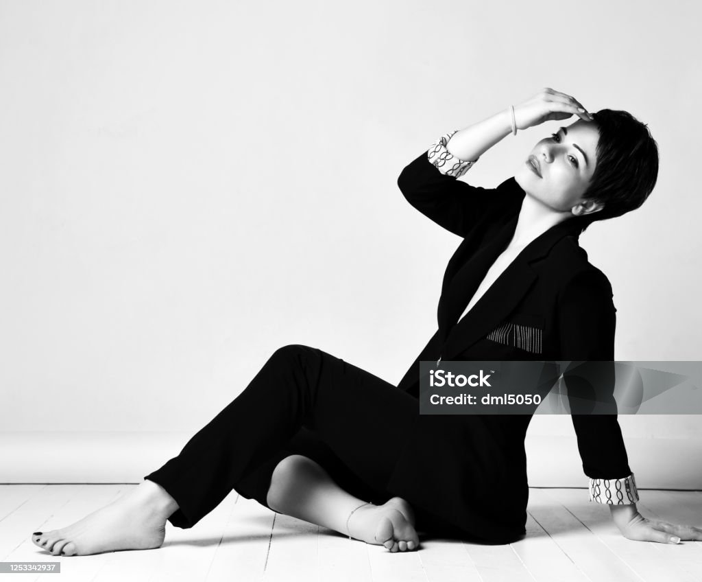 Young Beautiful Short Haired Brunette Woman In Elegant Business Suit