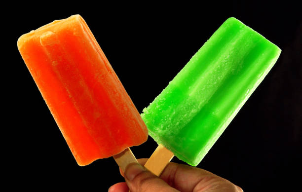 Free Stock Photo of Hand holding a red and white popsicle | Download ...