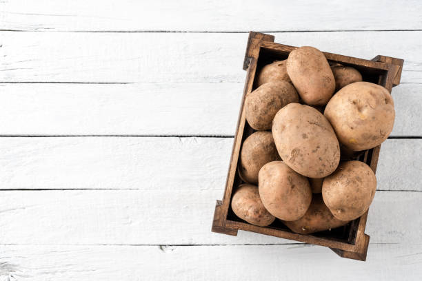 Free Stock Photo of Wooden Box Filled With Potatoes on Table | Download ...