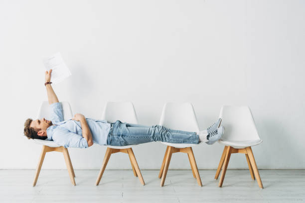 Free Stock Photo of A happy employee lying in the chair with a sticky ...