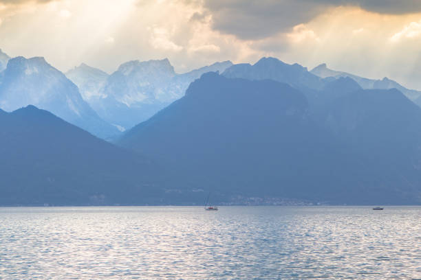 Solitary Sailboat On Lake Geneva With Dramatic Alpine Backdrop A – Free ...
