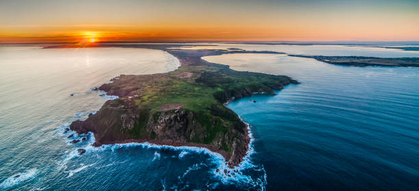Free Stock Photo of Aerial view of a coastal landscape at sunset ...