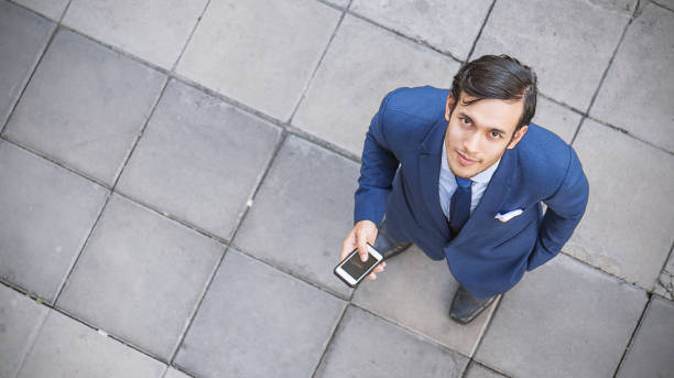 Free Stock Photo of Overhead view of businesspeople operating mobile ...
