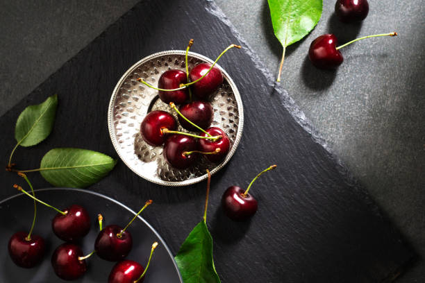Free Stock Photo of Pair of shiny fresh cherries on dark surface ...